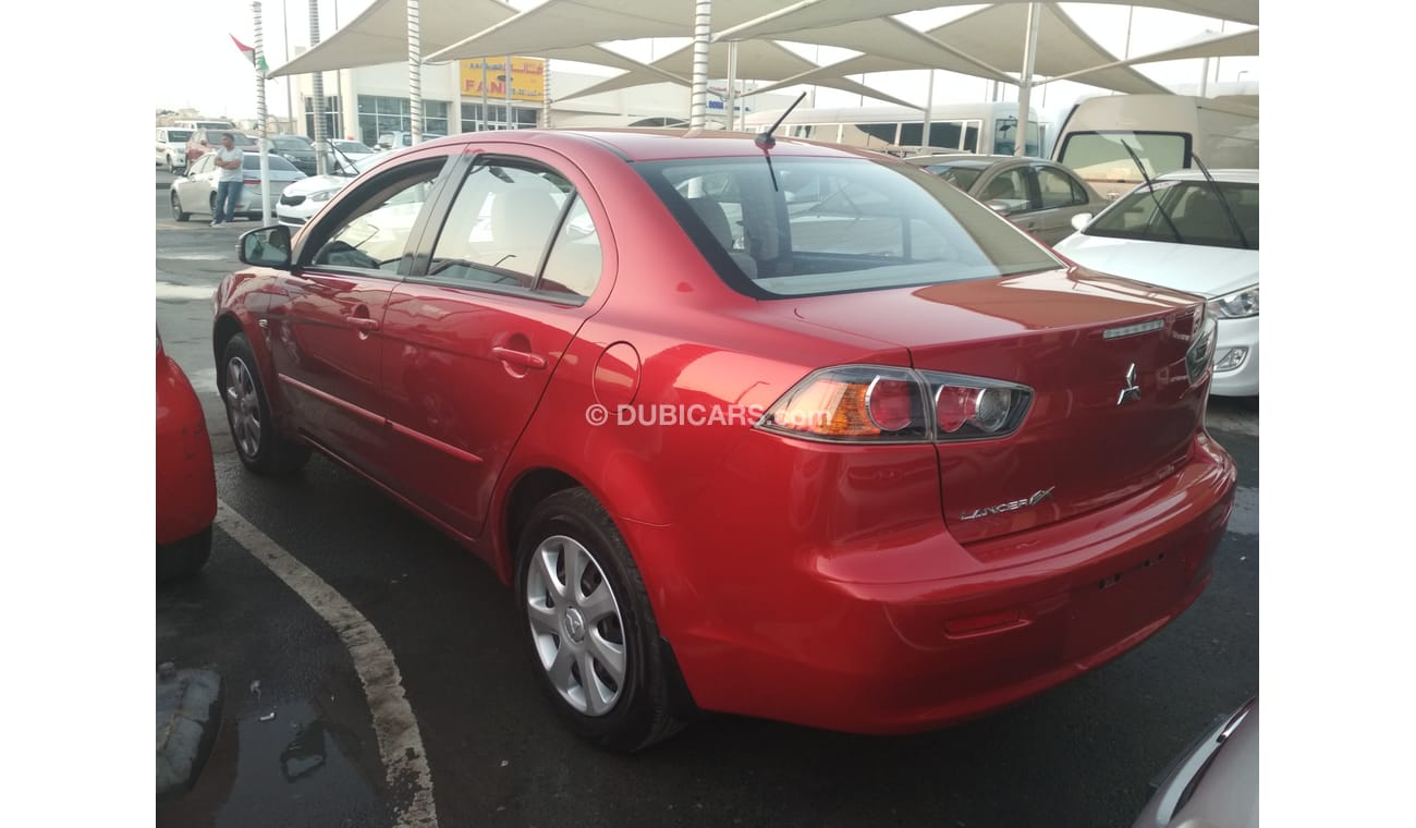 Used Mitsubishi Lancer RED 2015 GCC NO PAIN NO ACCIDENT PERFECT 2015 ...