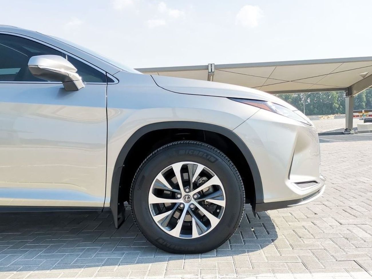 Used Lexus RX450H - Hybrid - 2022 - Gold 2022 for sale in Sharjah - 708273