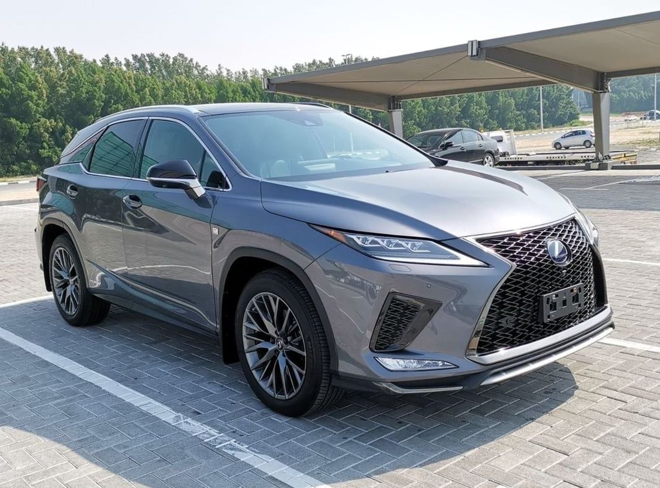Used F Sport Lexus RX450h Hybrid ( F-Sport ) - 2022 - Grey 2022 for sale in Sharjah - 717257