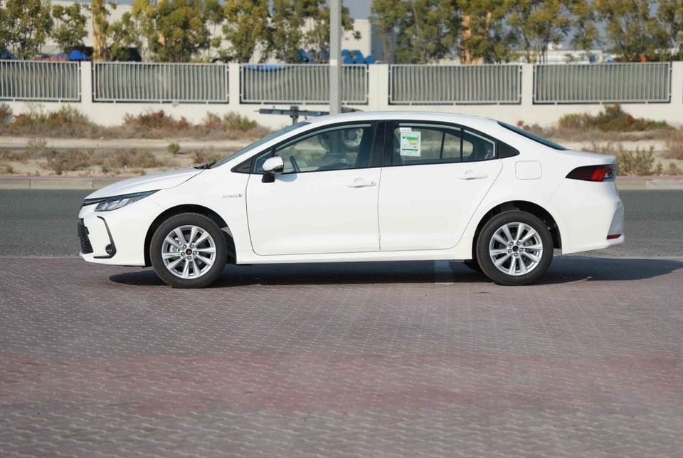 New 2024 TOYOTA COROLLA LOW HYBRID 1.8 - SUPER WHITE inside FROMAGE ...