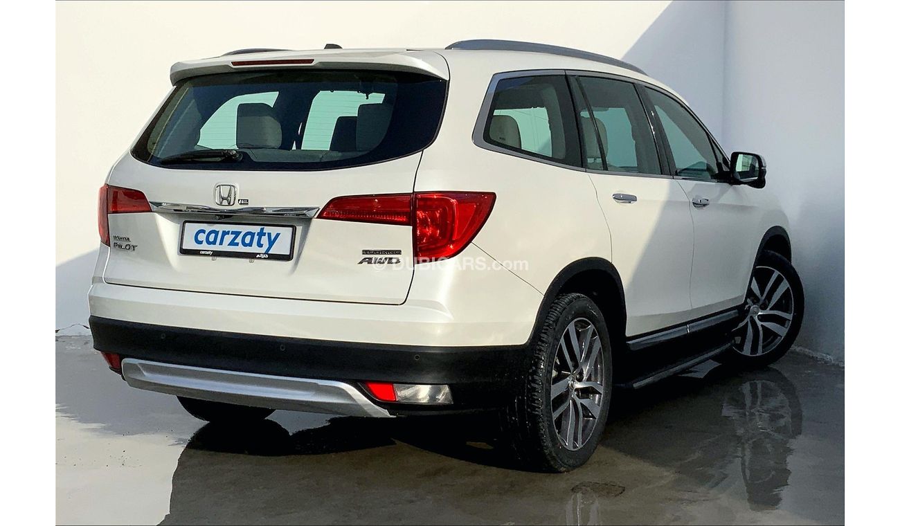 Used Honda Pilot Touring 2016 for sale in Dubai - 445385