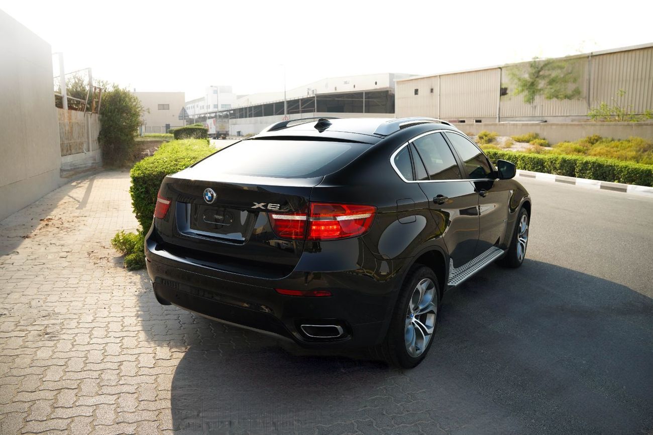Used BMW X6 50i Exclusive 4.4L 2014 for sale in Dubai - 857639