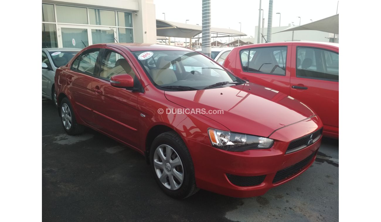 Used Mitsubishi Lancer RED 2015 GCC NO PAIN NO ACCIDENT PERFECT 2015 ...