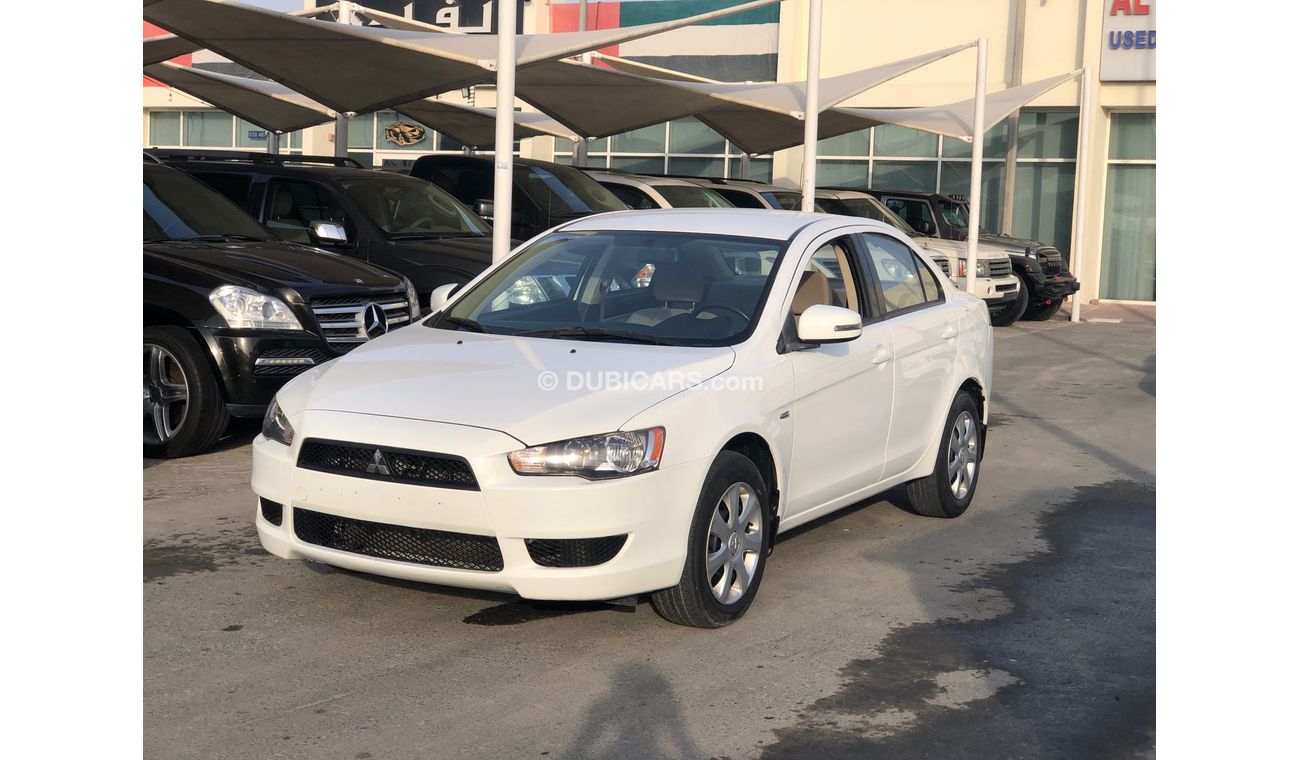 Used Mitsubishi Lancer 2015 for sale in Dubai - 540311