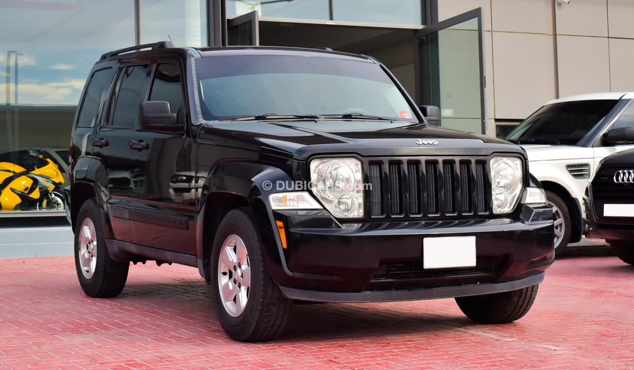 Used Jeep Liberty 4x4 2012 for sale in Abu Dhabi - 572908