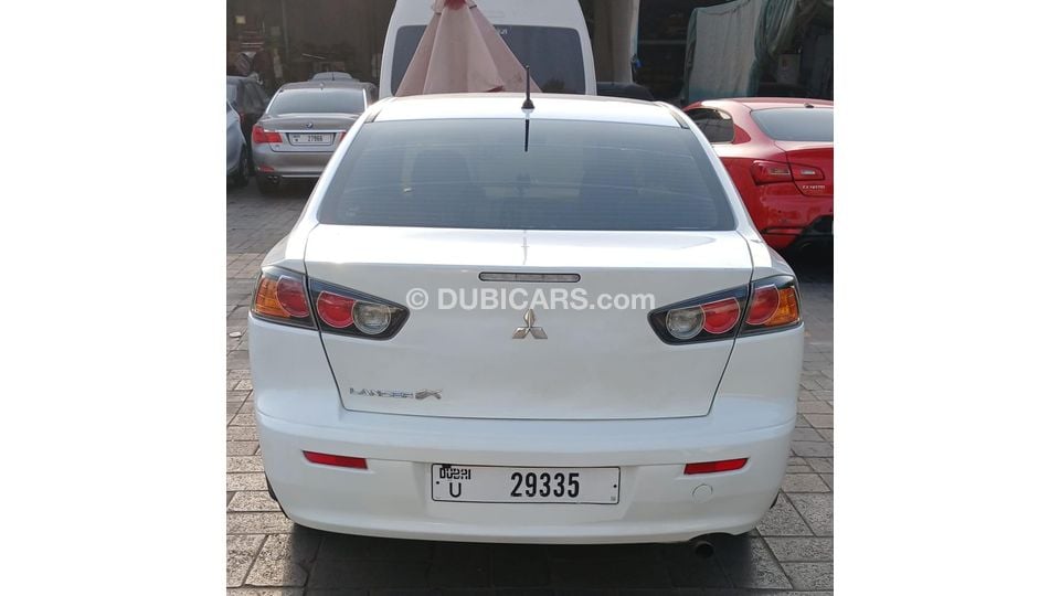 Used Mitsubishi Lancer For Local 2.0L FWD white color A/T 2014 for sale ...