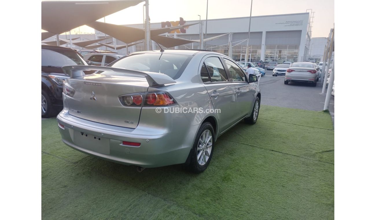 Used Mitsubishi Lancer 2016 Gulf model without accidents, screen slot ...