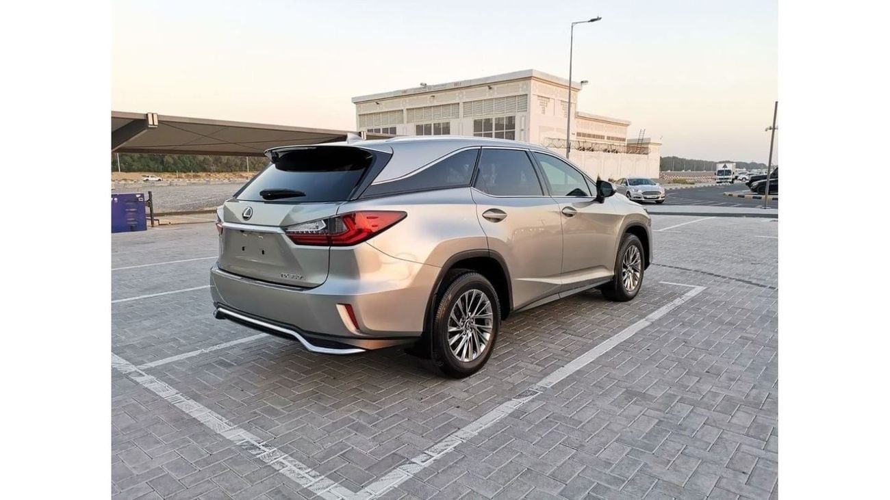 Used Lexus RX350L ( Long ) - 2022 - Gold 2022 for sale in Sharjah - 751281