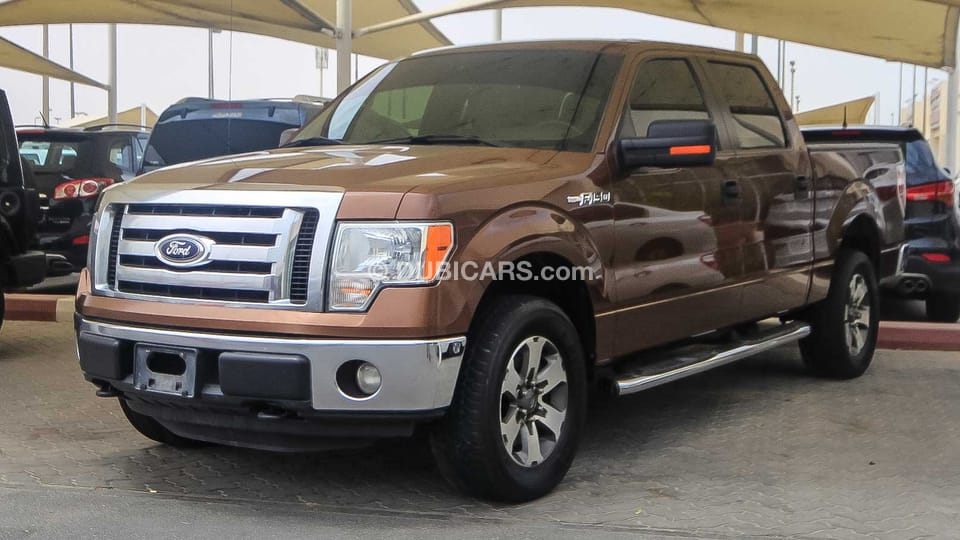 Ford F 150 XLT for sale: AED 47,000. Brown, 2012