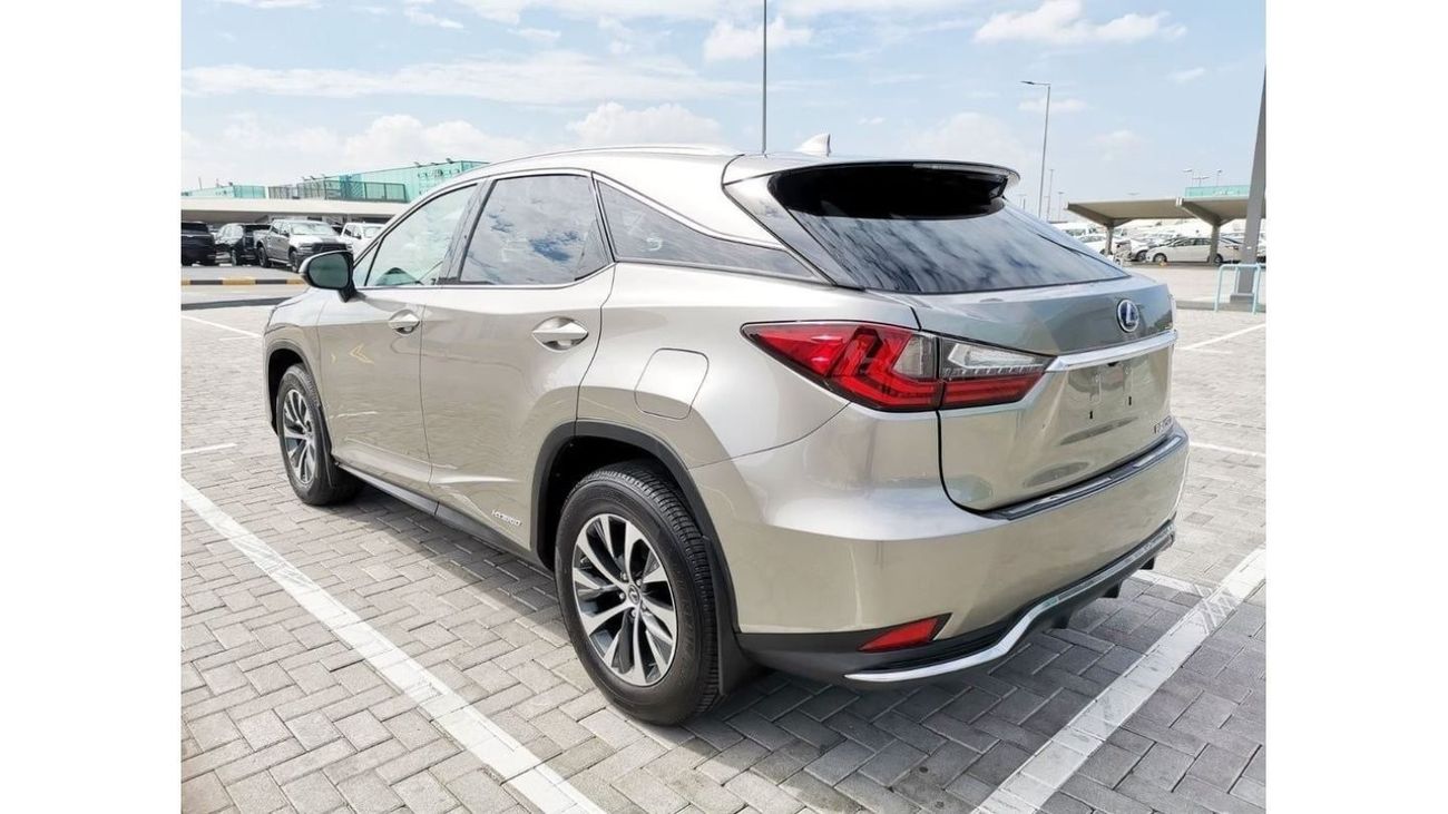 Used Lexus RX450h Hybrid - 2021 - Gold 2021 for sale in Sharjah - 715118