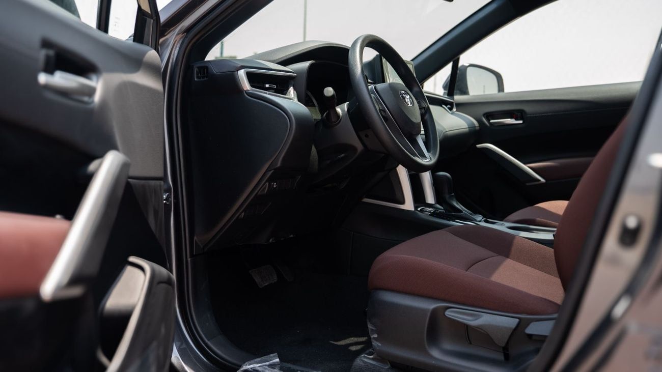 New 2025 Toyota Corolla Cross MID 1.8 Hybrid - Grey Mettalic Inside Red ...
