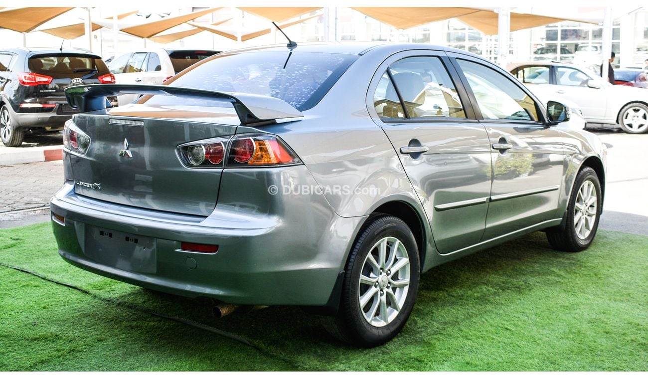 Used Mitsubishi Lancer Gulf gray color, inside beige without accidents ...