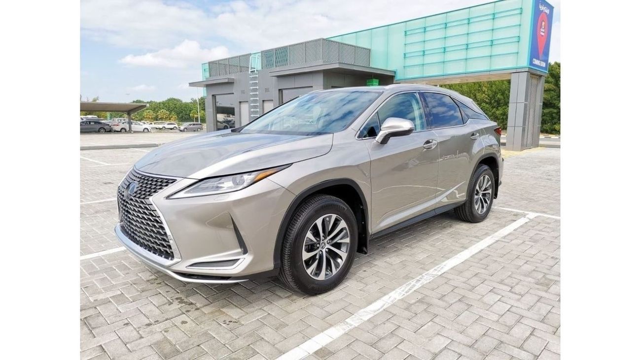 Used Lexus RX450h Hybrid - 2021 - Gold 2021 for sale in Sharjah - 715118