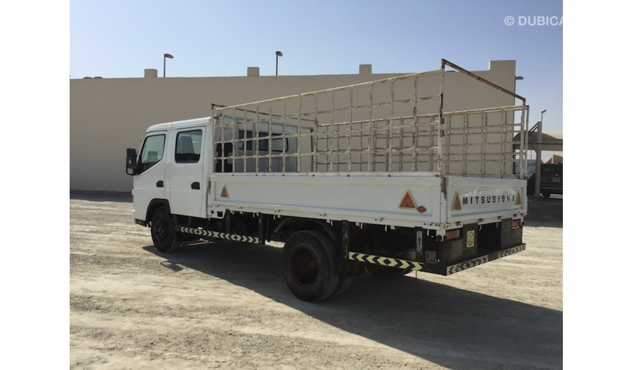 Used Mitsubishi Fuso Canter DOUBLE CABIN GRILL BODY GCC SPECS 2015 for ...