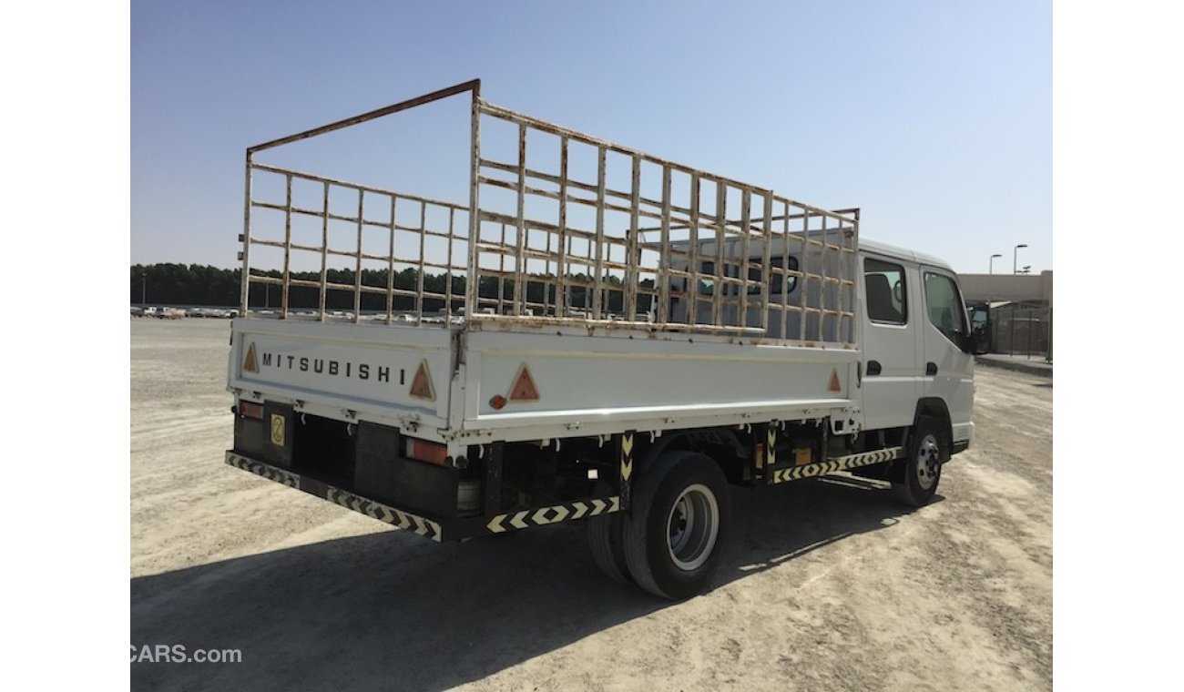 Used Mitsubishi Fuso Canter DOUBLE CABIN GRILL BODY GCC SPECS 2015 for ...