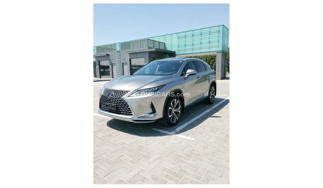 Used Lexus RX350 - 2022- Gold 2022 for sale in Sharjah - 618239