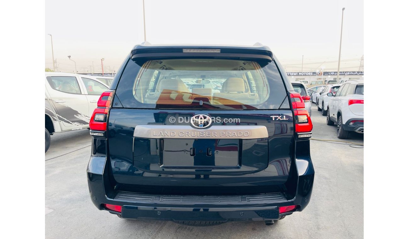 جديدة تويوتا برادو TXL 2.7L petrol 4WD( with sunroof ) spare down 2023 للبيع في دبي - 622098