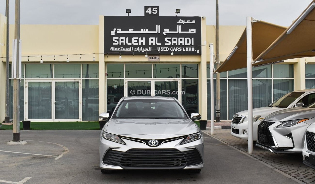 Used Toyota Camry HYBRID LE 2020 for sale in Dubai - 673724