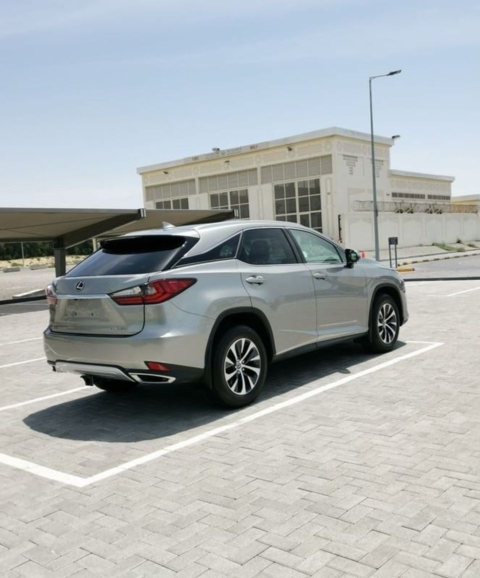 Used Lexus RX350 - 2021 - Gold 2021 for sale in Sharjah - 607160