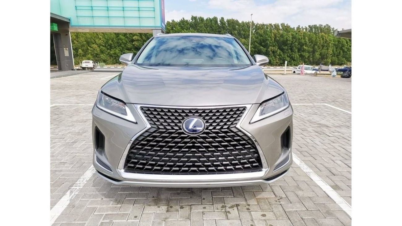 Used Lexus RX450h Hybrid - 2021 - Gold 2021 for sale in Sharjah - 715118