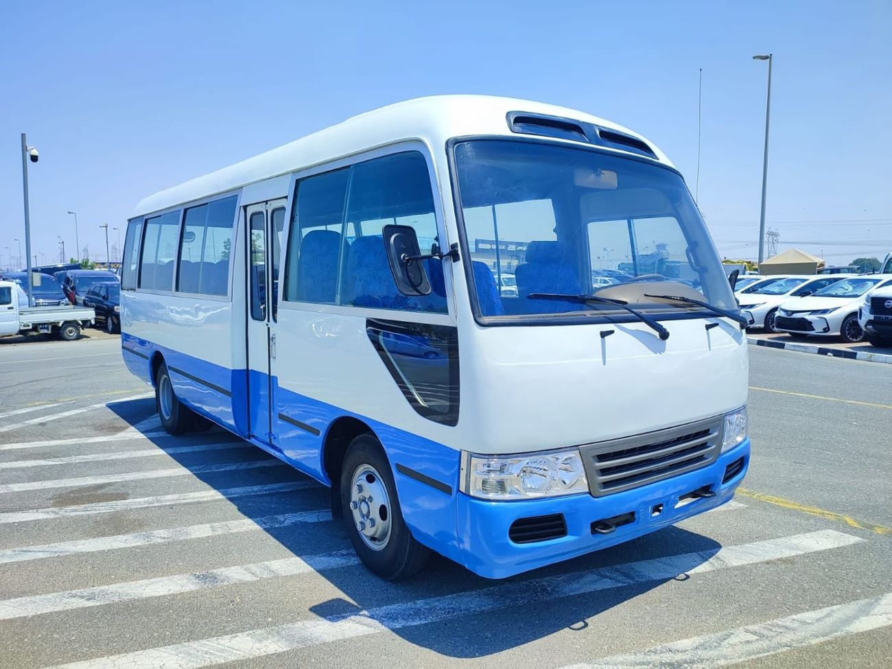 New JTB43PB51W6000527 || TOYOTA COASTER (BUS) || 2009 WHITE/BLUE MANUAL ...
