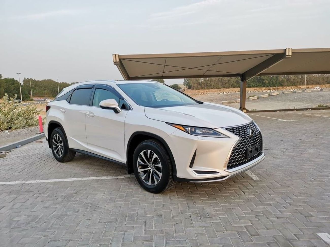 Used Lexus RX350 - 2022 - White 2022 for sale in Sharjah - 759072