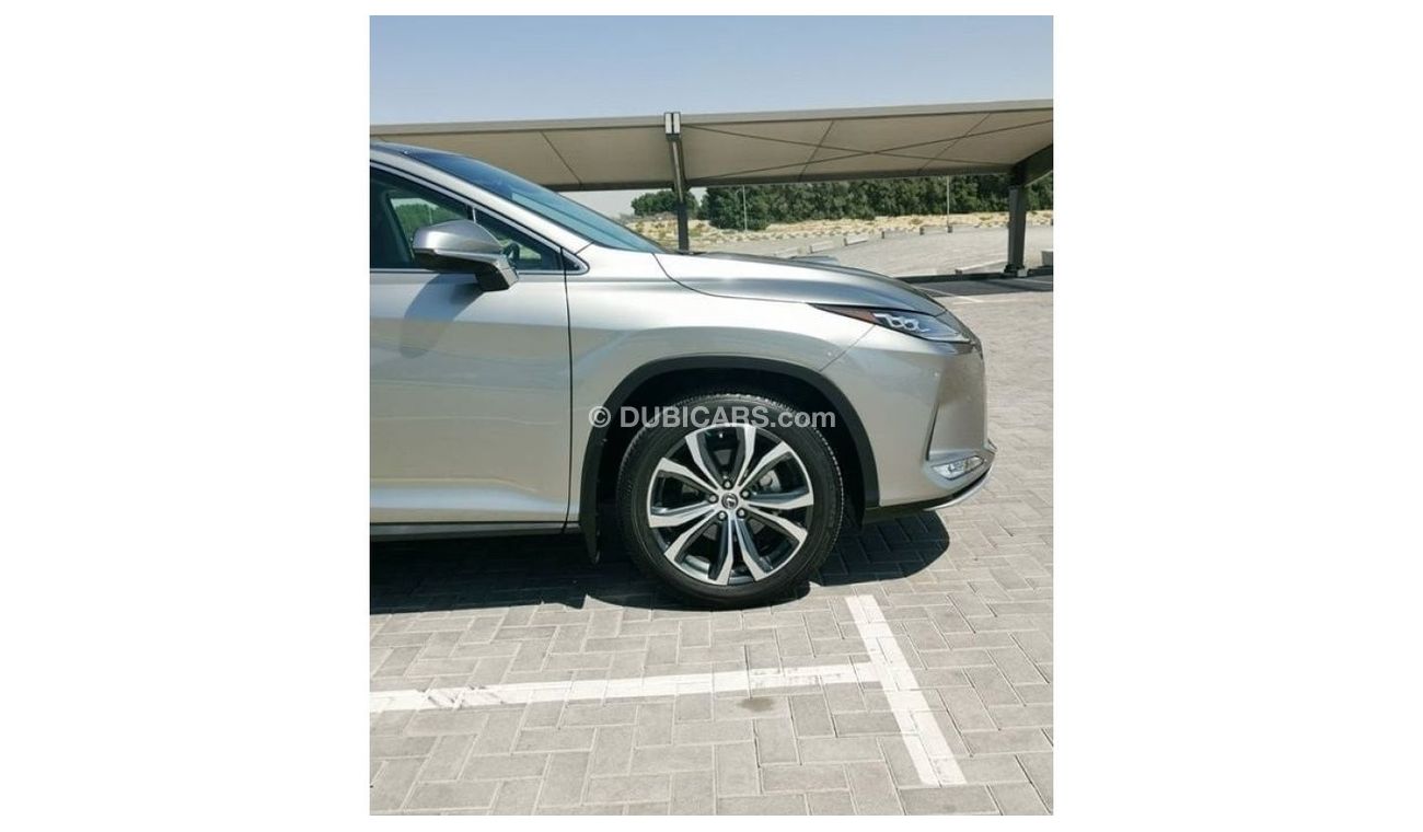 Used Lexus RX350 - 2022- Gold 2022 for sale in Sharjah - 618239