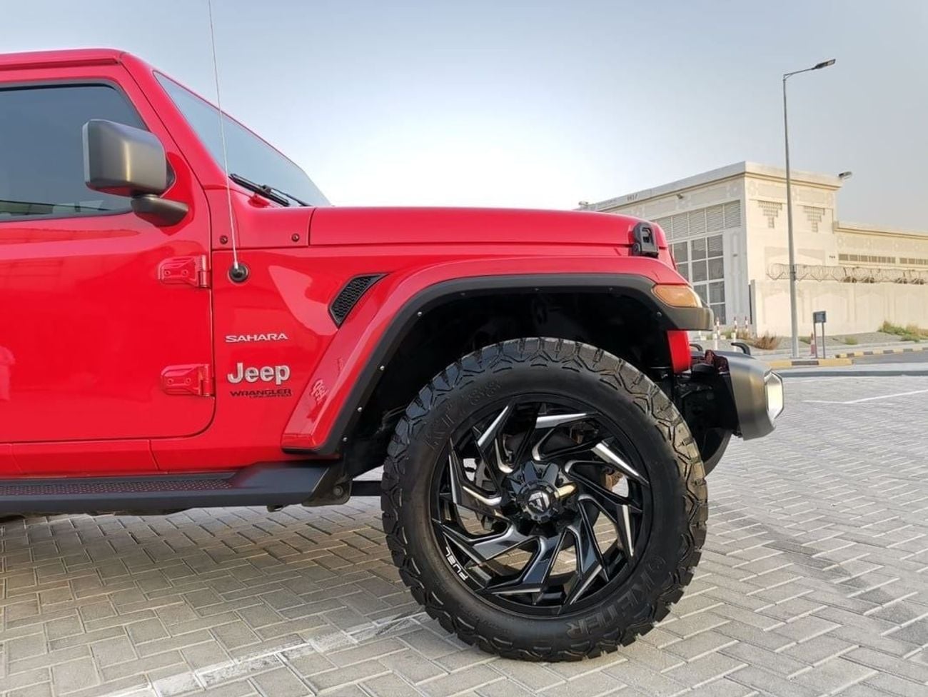 Used Jeep Wrangler Sahara - 2021 - Red 2021 for sale in Sharjah - 772677