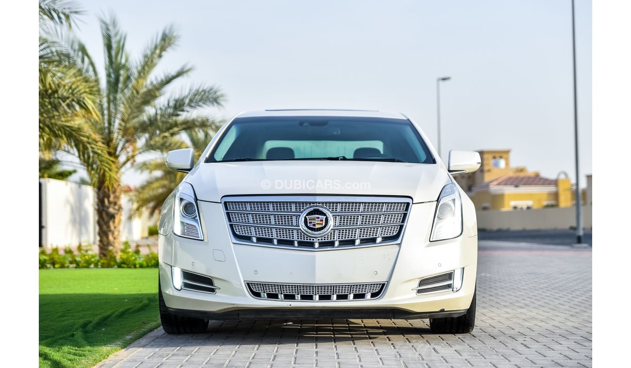 Used Cadillac XTS 4 2013 for sale in Dubai - 164726