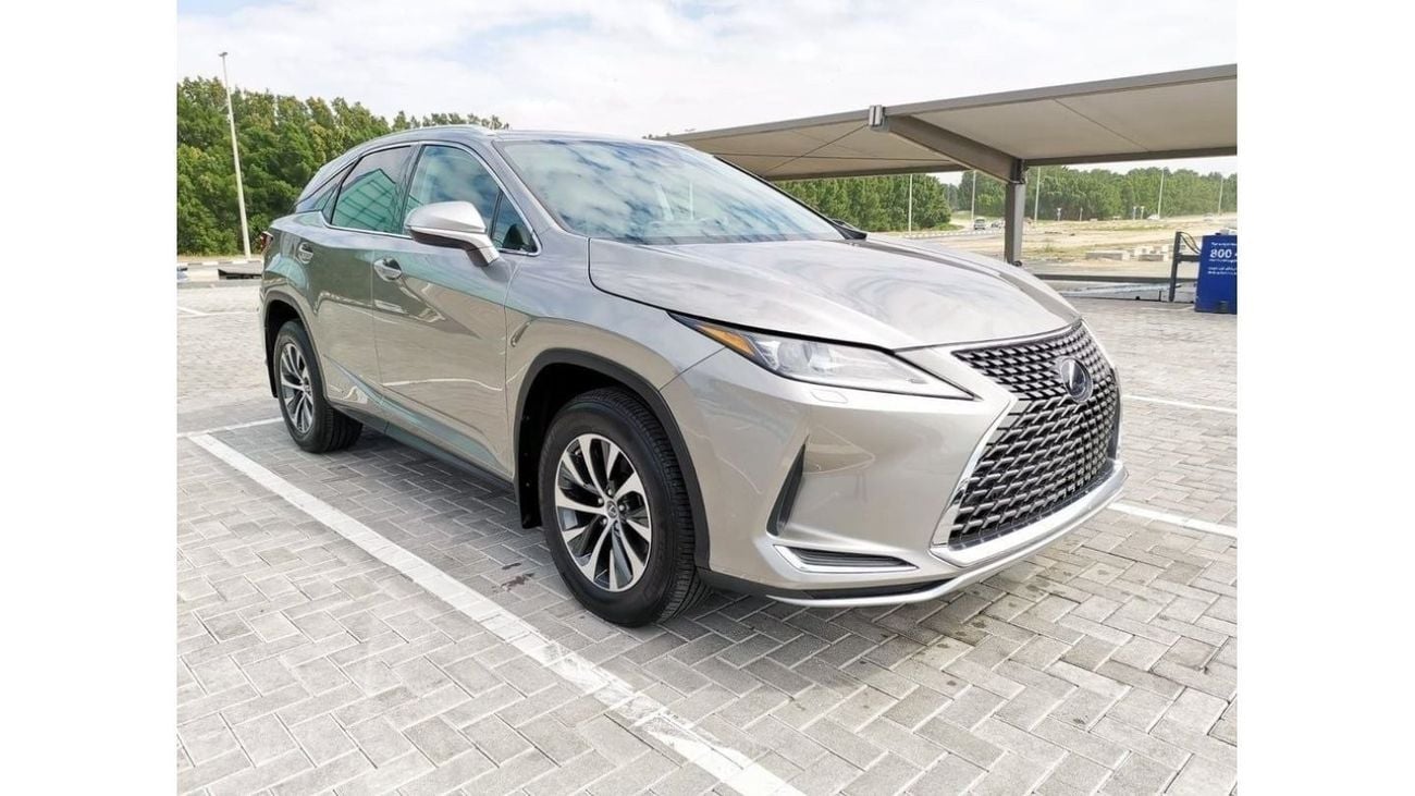 Used Lexus RX450h Hybrid - 2021 - Gold 2021 for sale in Sharjah - 715118